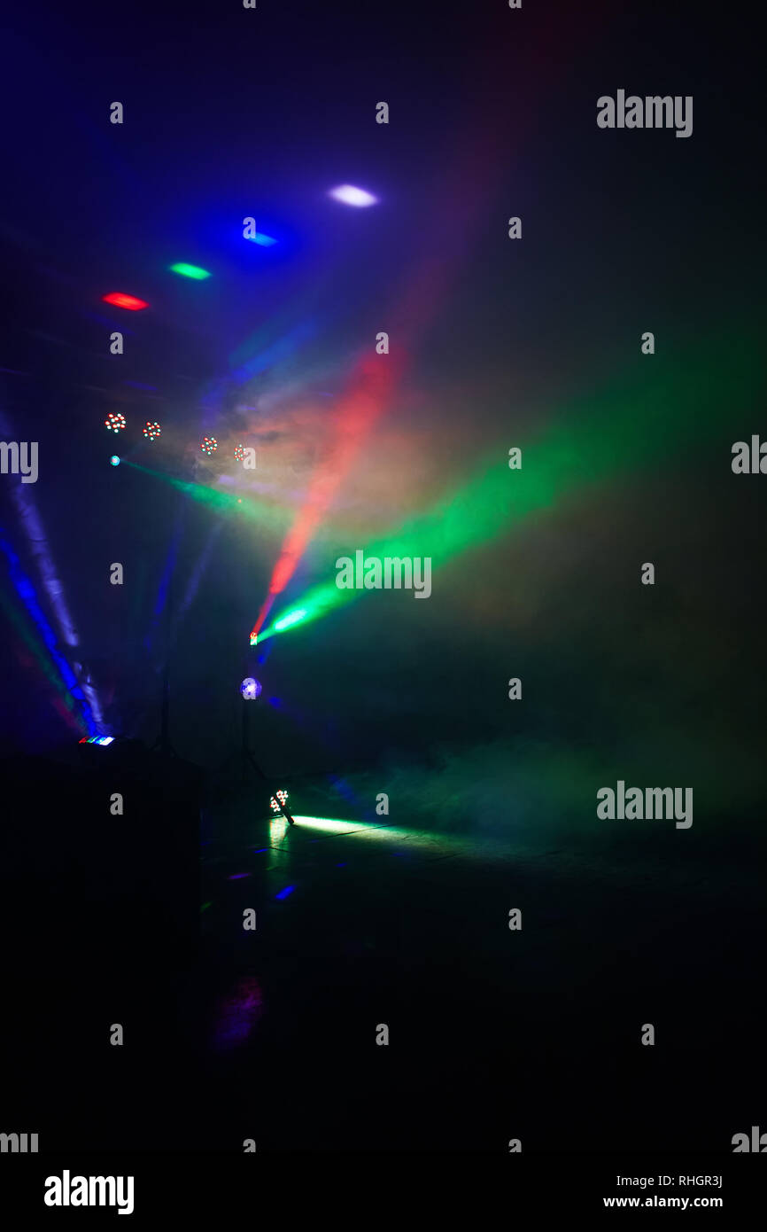 Stage lights in action at the concert. Lights show. Lazer show. Night ...