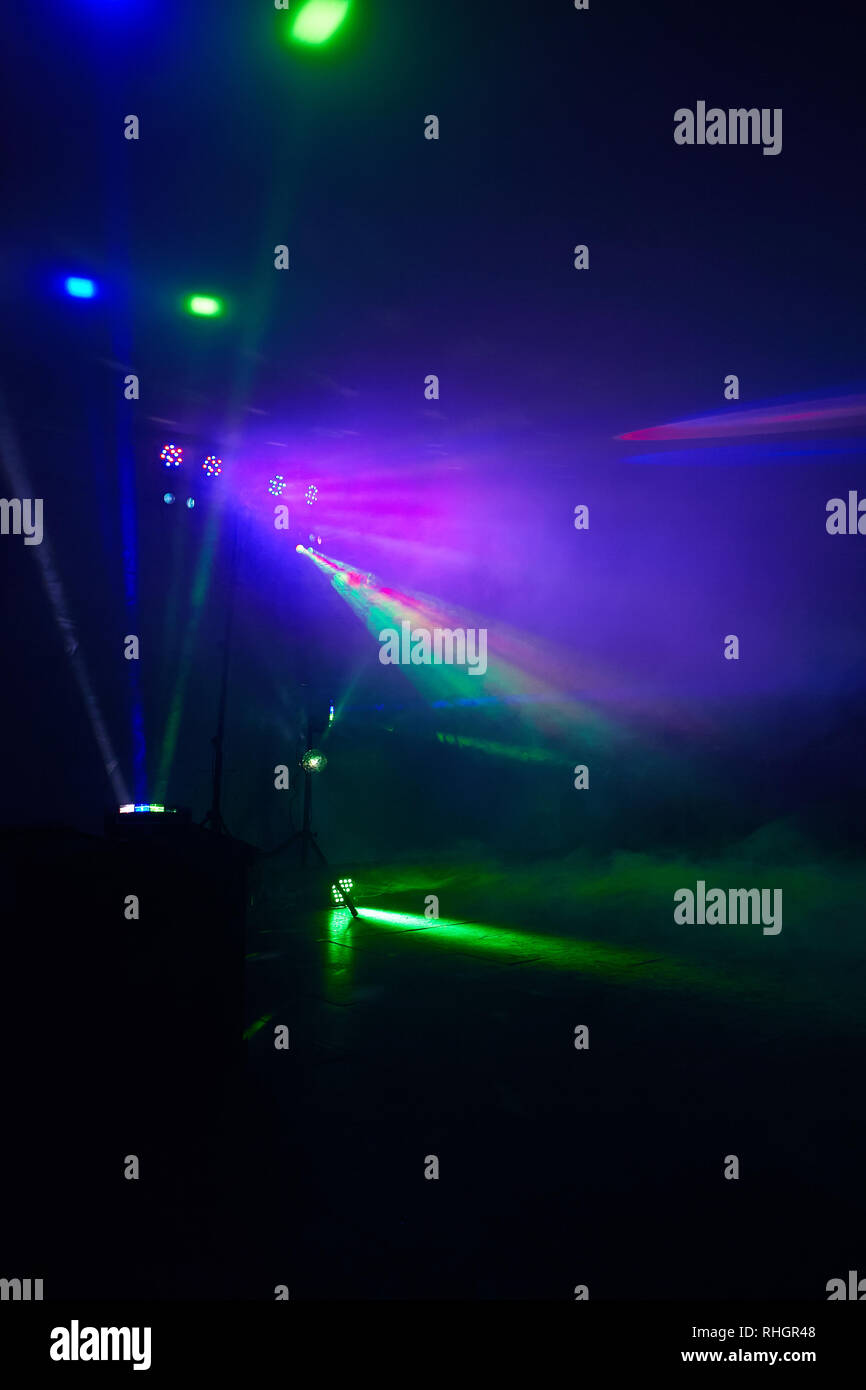 Stage lights in action at the concert. Lights show. Lazer show. Night ...