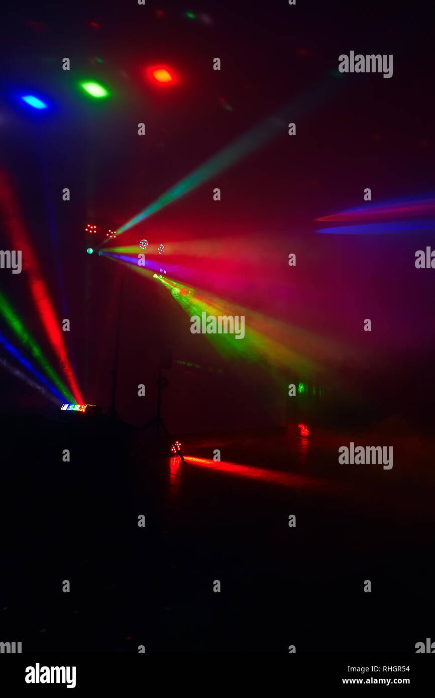 Stage lights in action at the concert. Lights show. Lazer show. Night ...