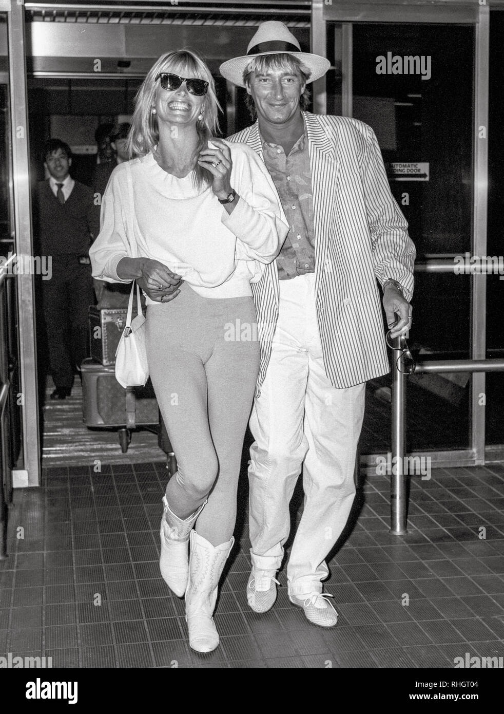 British Rock singer Rod Stewart and girlfriend Kelly Emberg at Heathrow ...