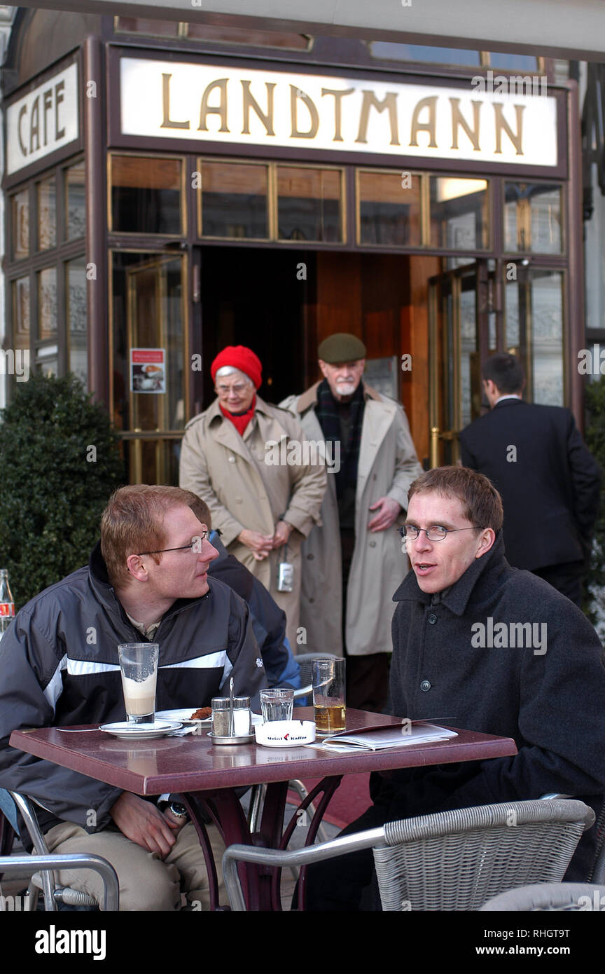 Friends at the terrace of the famous Cafe Landtmann, Vienna, Austria ...