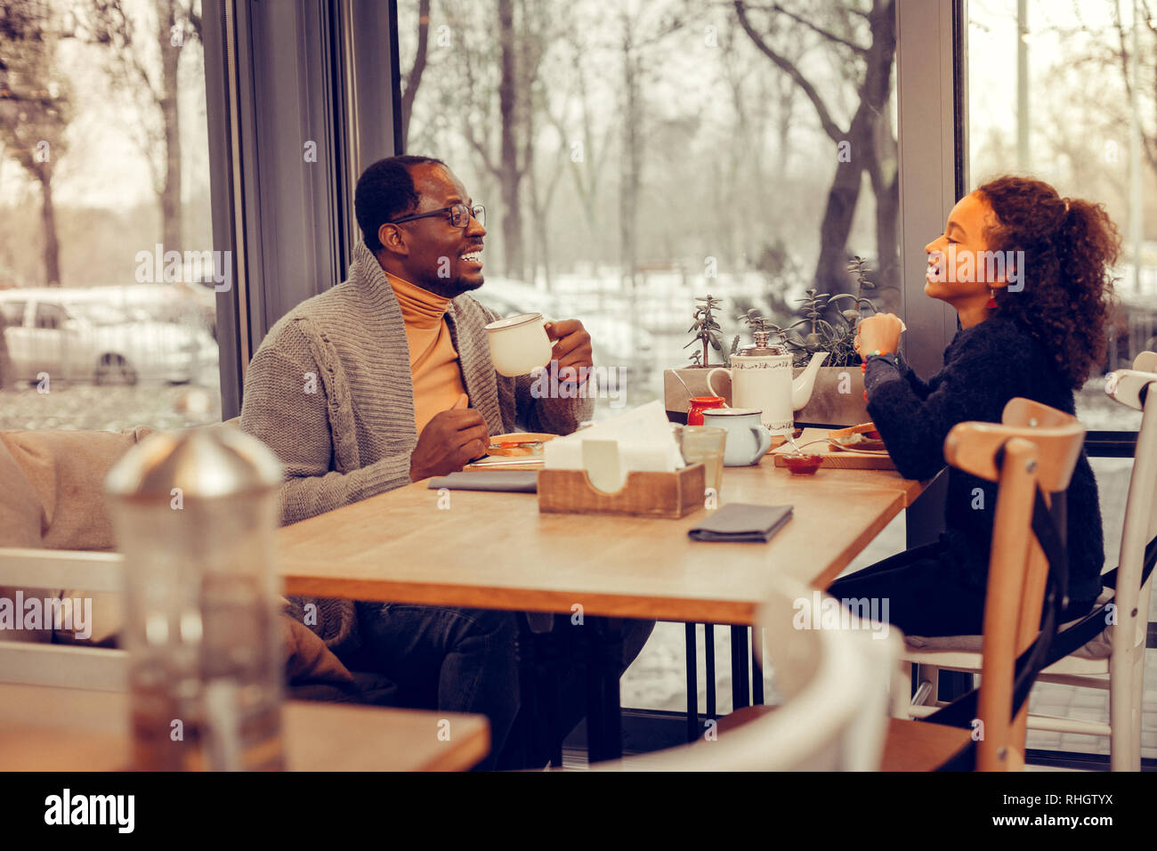 Father and daughter feeling memorable while joking together Stock Photo ...
