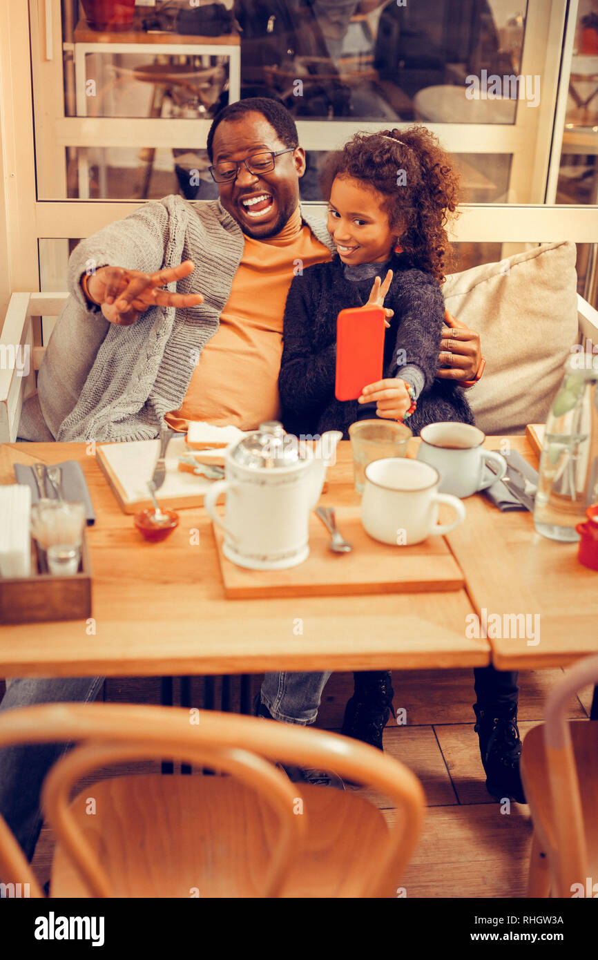 Teenager making face at father hi-res stock photography and images - Alamy