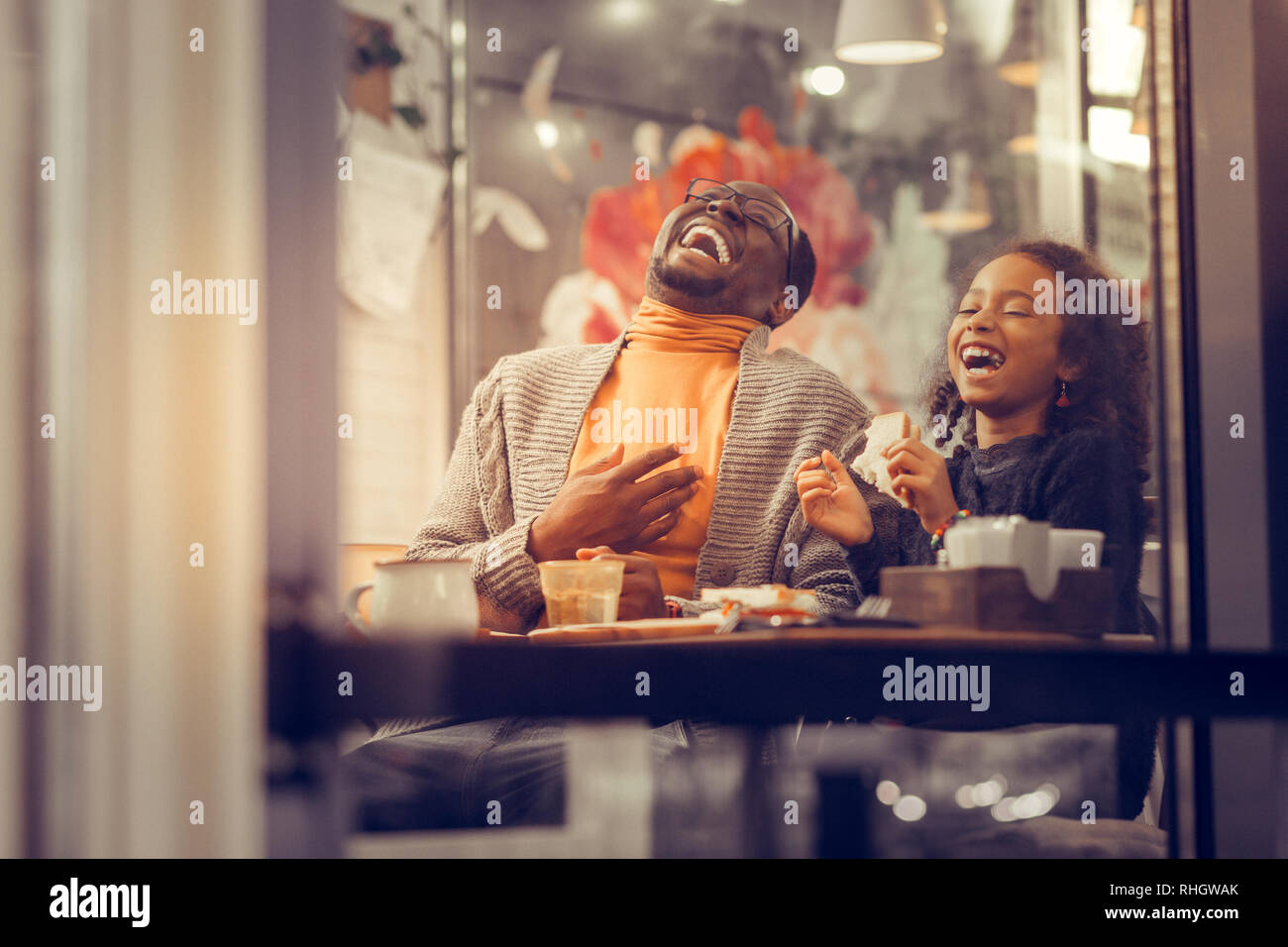 Father and daughter laughing out loud feeling happy together Stock ...