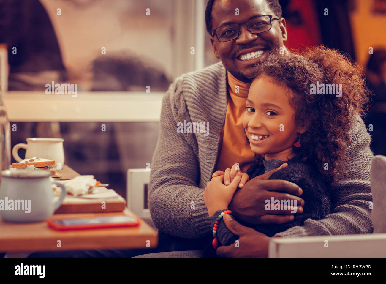 Man hugging daughter food hi-res stock photography and images - Alamy