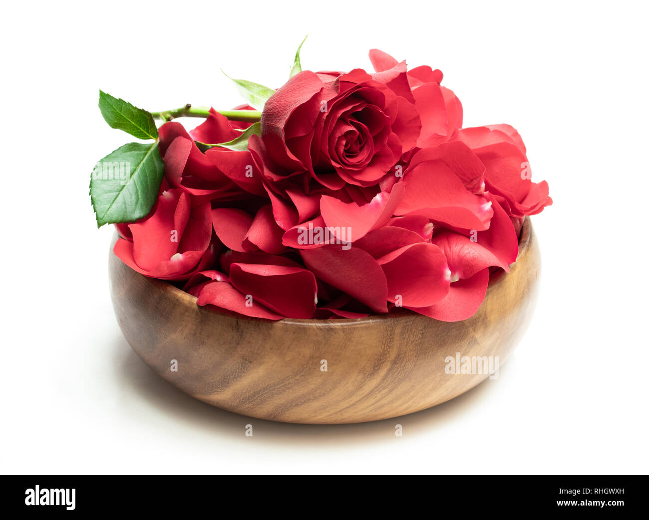Heap of red rose petals in wooden table isolated on white Stock Photo ...