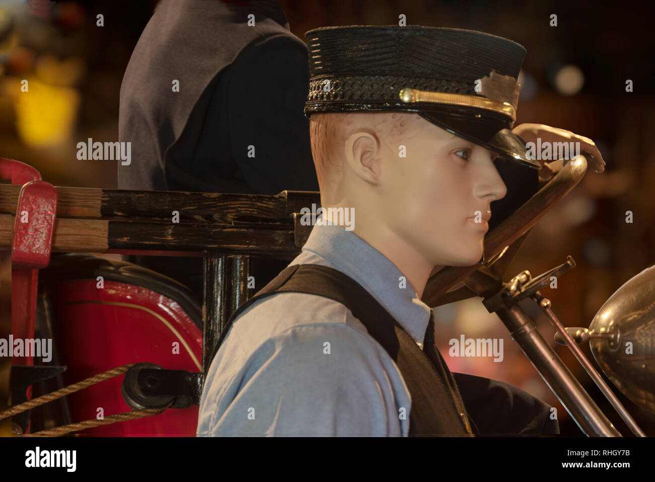 Fireman in fire truck. 1917 fire engine made by oldsmobile. It was in ...