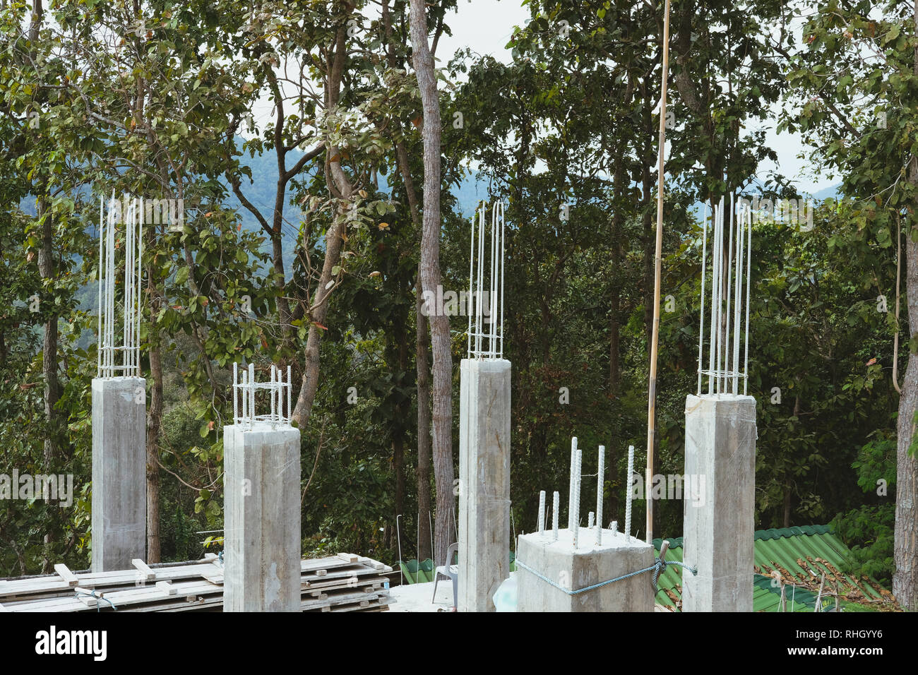 building pole pillar with steel & cement concrete under construction ...