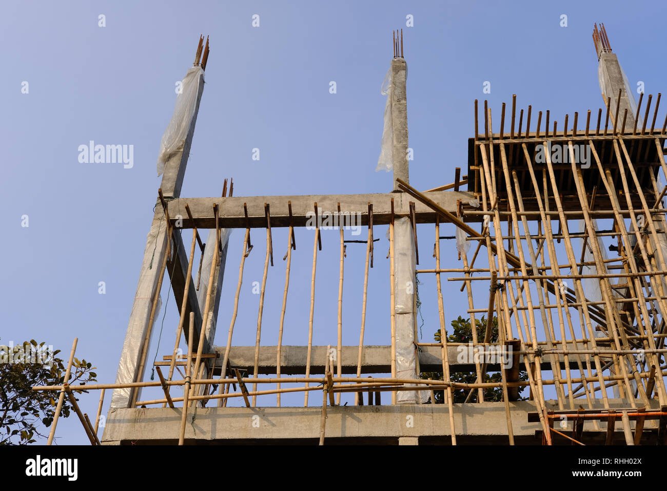 building pole pillar with steel & cement concrete under construction ...