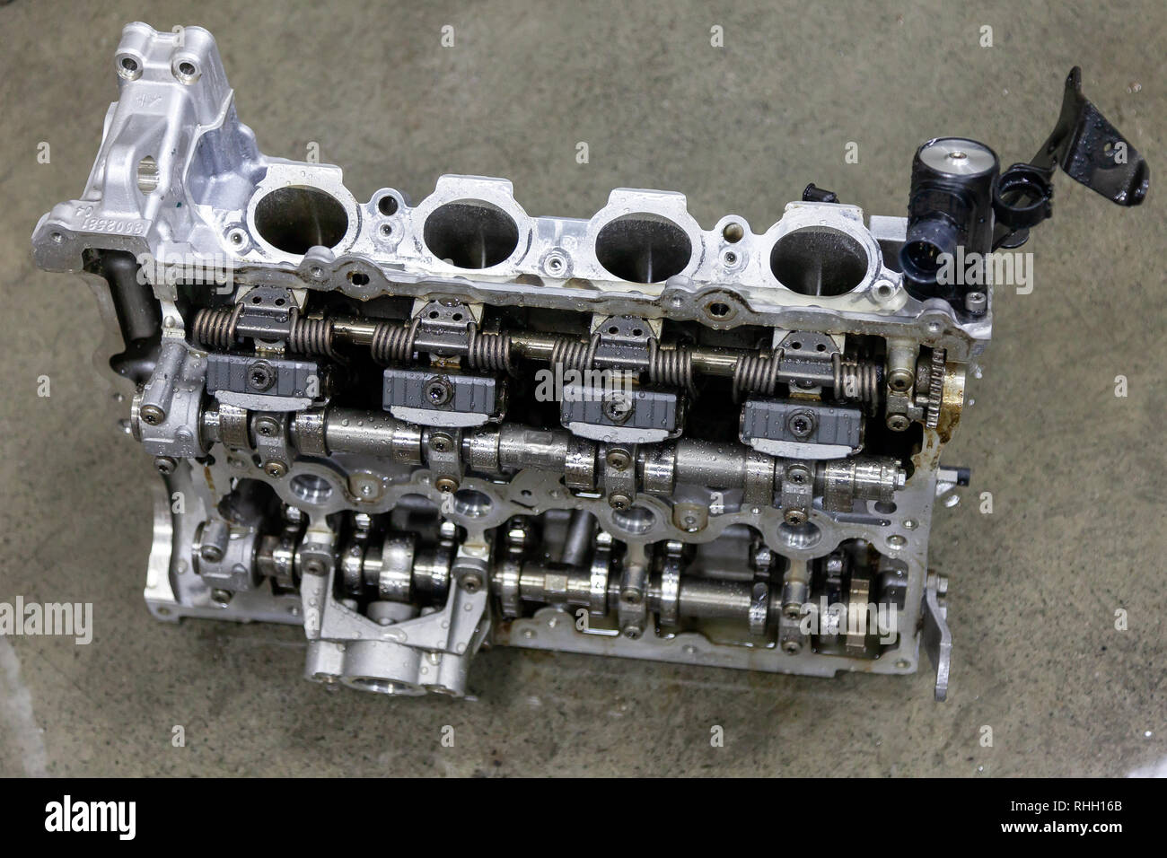 Part of the engine removed from the used car for the repair of silver ...