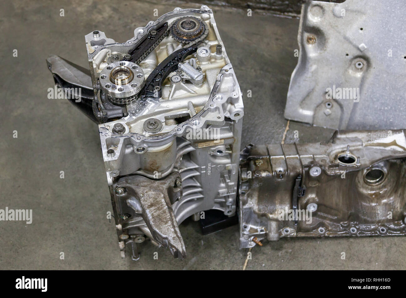 Part of the engine removed from the used car for the repair of silver ...