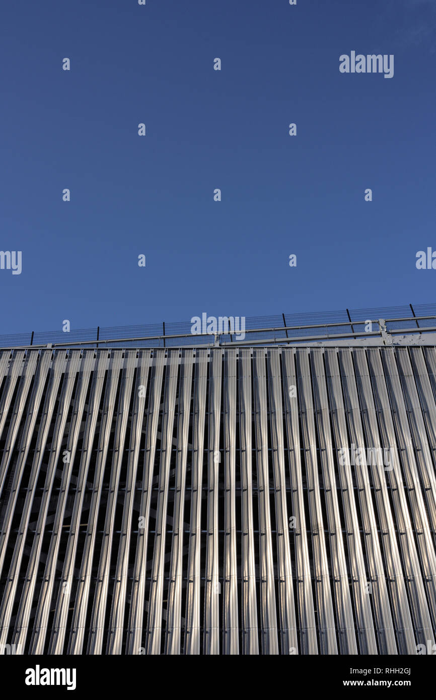 Multi storey car park with metal cladding, low angle view in bury town ...
