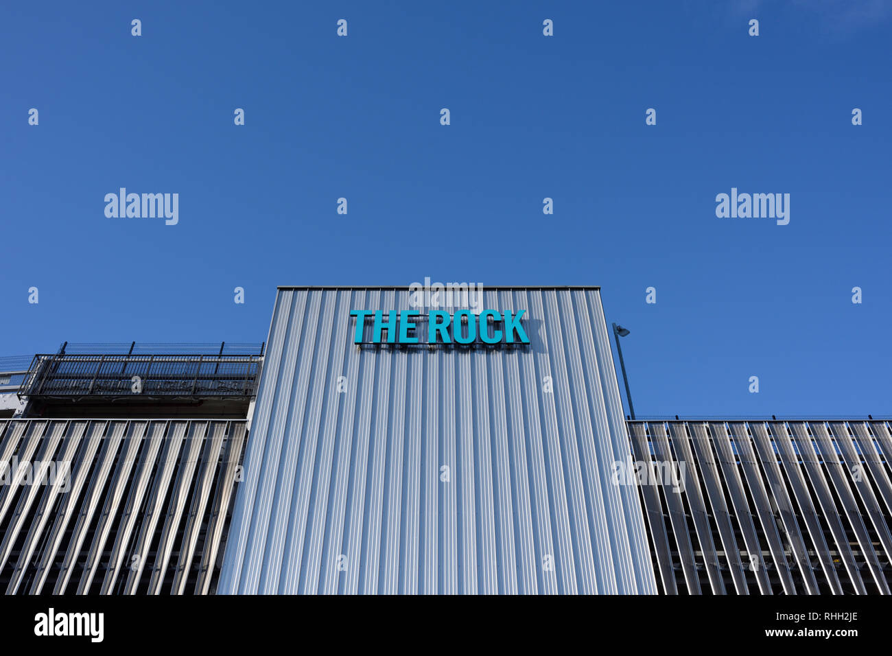 Multi storey car park with vertical rainscreen metal cladding and ...