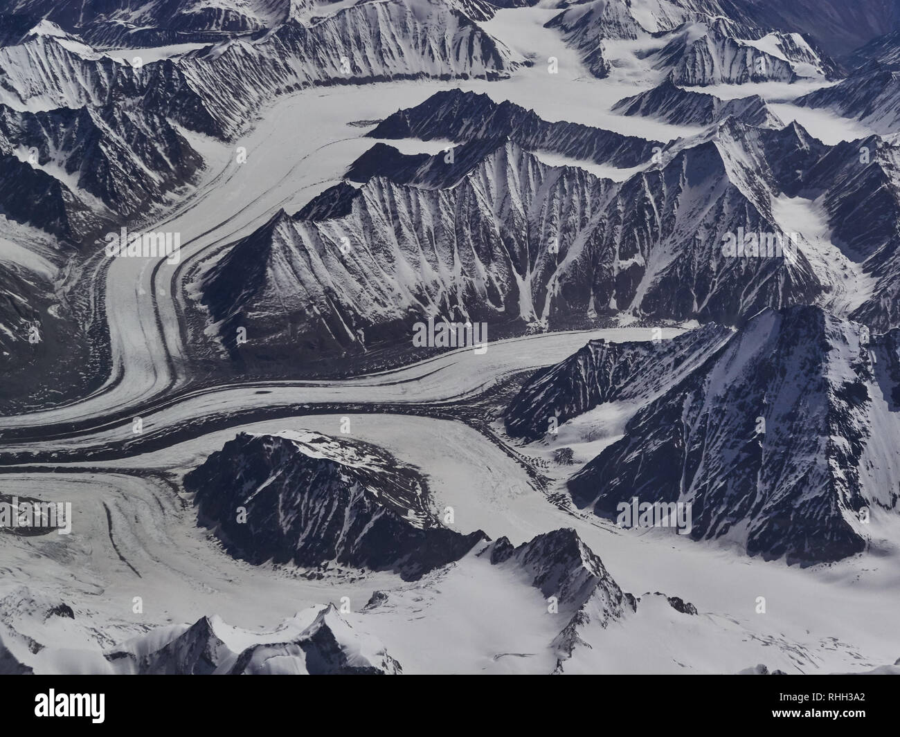 Morena and tongues high mountains glacier among brown mountains, taken ...