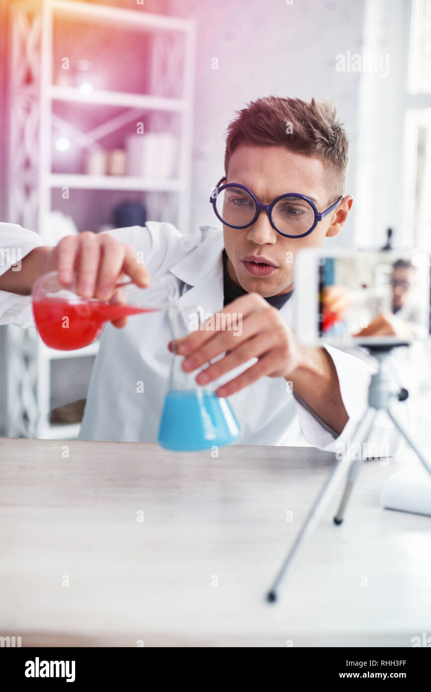 Smart male student making funny hi-res stock photography and images - Alamy