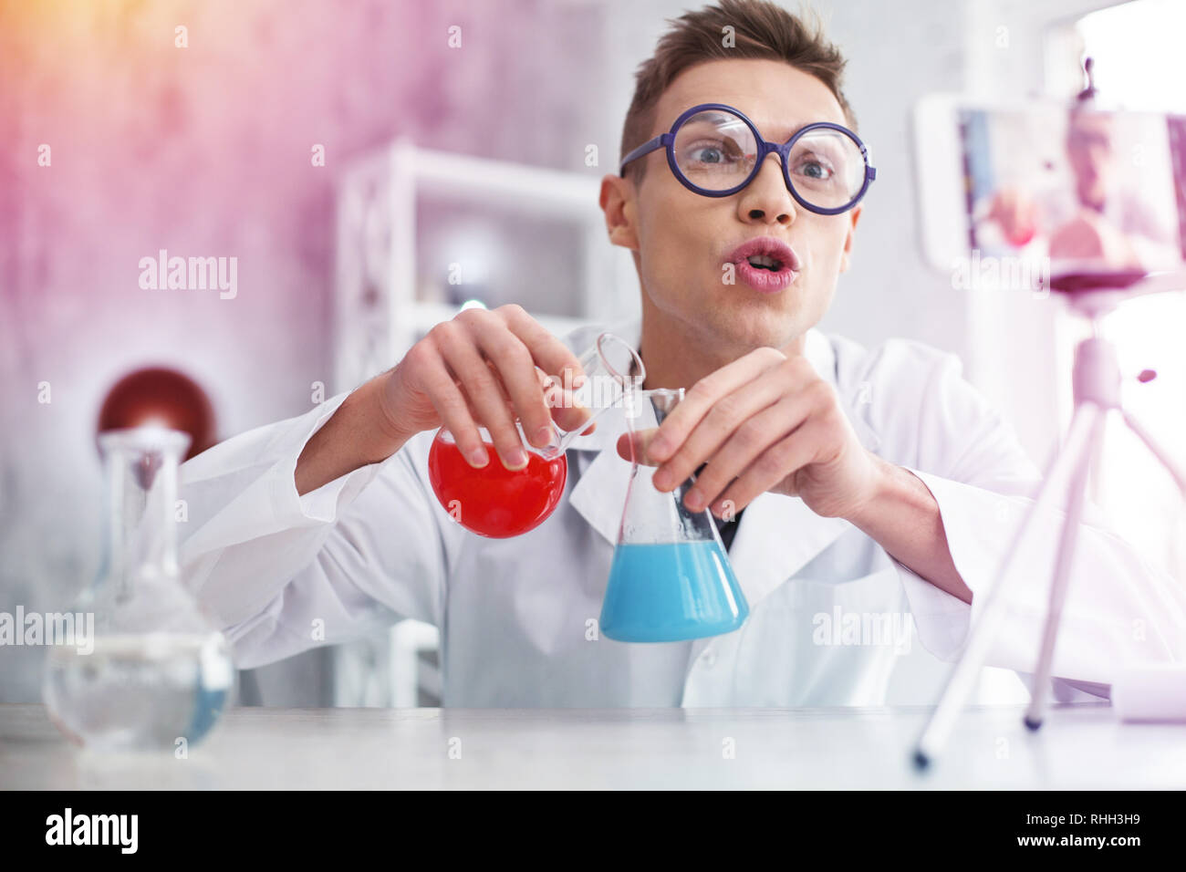 Famous video blogger telling his followers about chemistry experiment ...