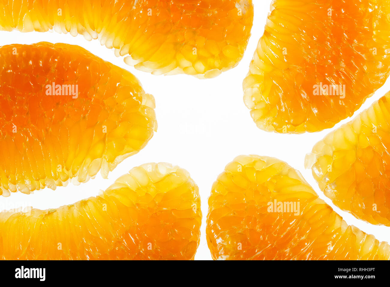 Pomelo fruit macro photography. Peeled pomelo slice on a white ...