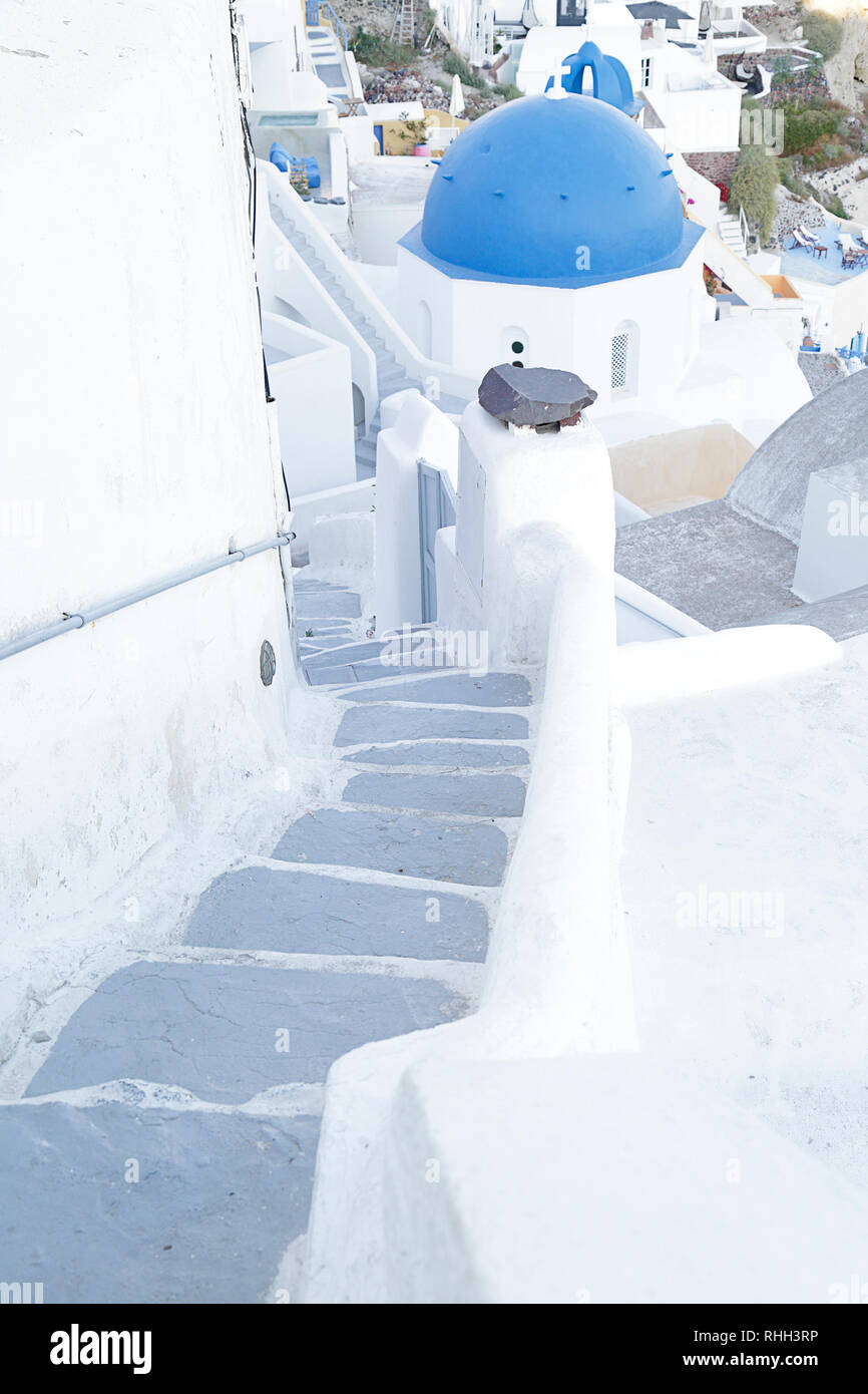 Stairs in a street of the famous white Oia village, Santorini Island ...