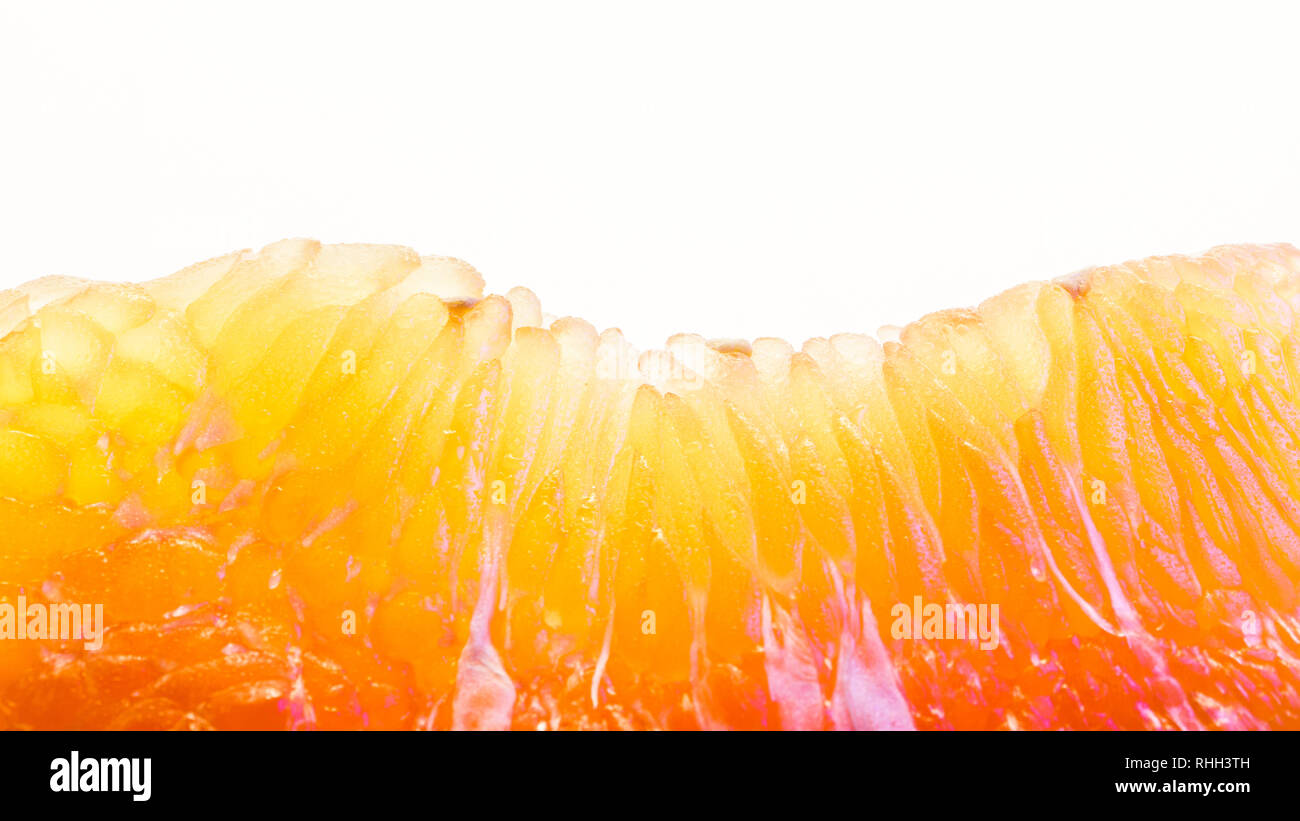 Pomelo fruit macro photography. Peeled pomelo slice on a white ...