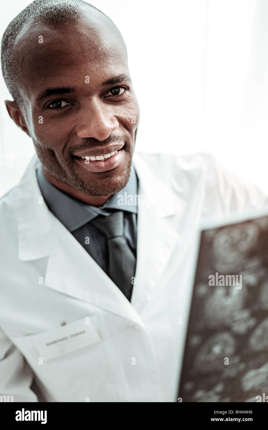 Portrait of handsome doctor that looking at camera Stock Photo - Alamy