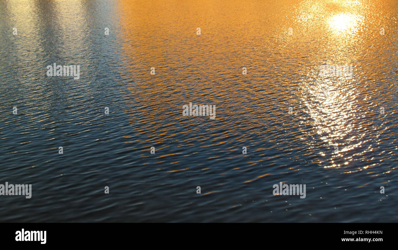 beautiful sunset water background Stock Photo - Alamy