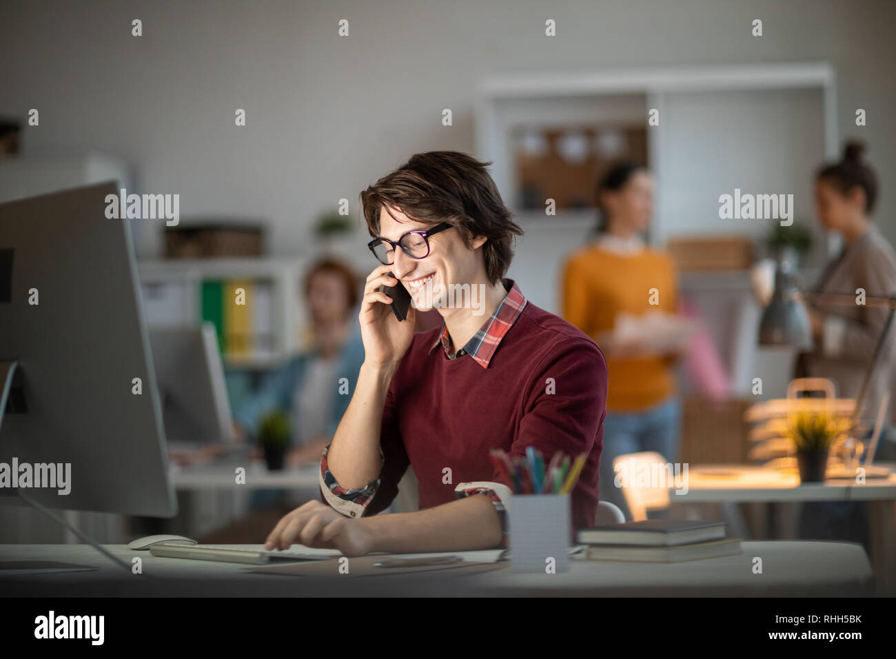 Happy designer hi-res stock photography and images - Alamy