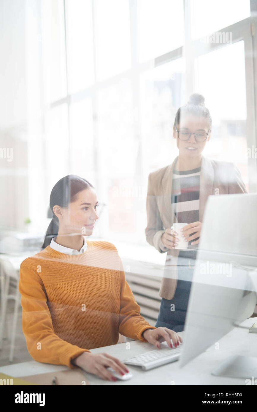 Girls by computer Stock Photo - Alamy