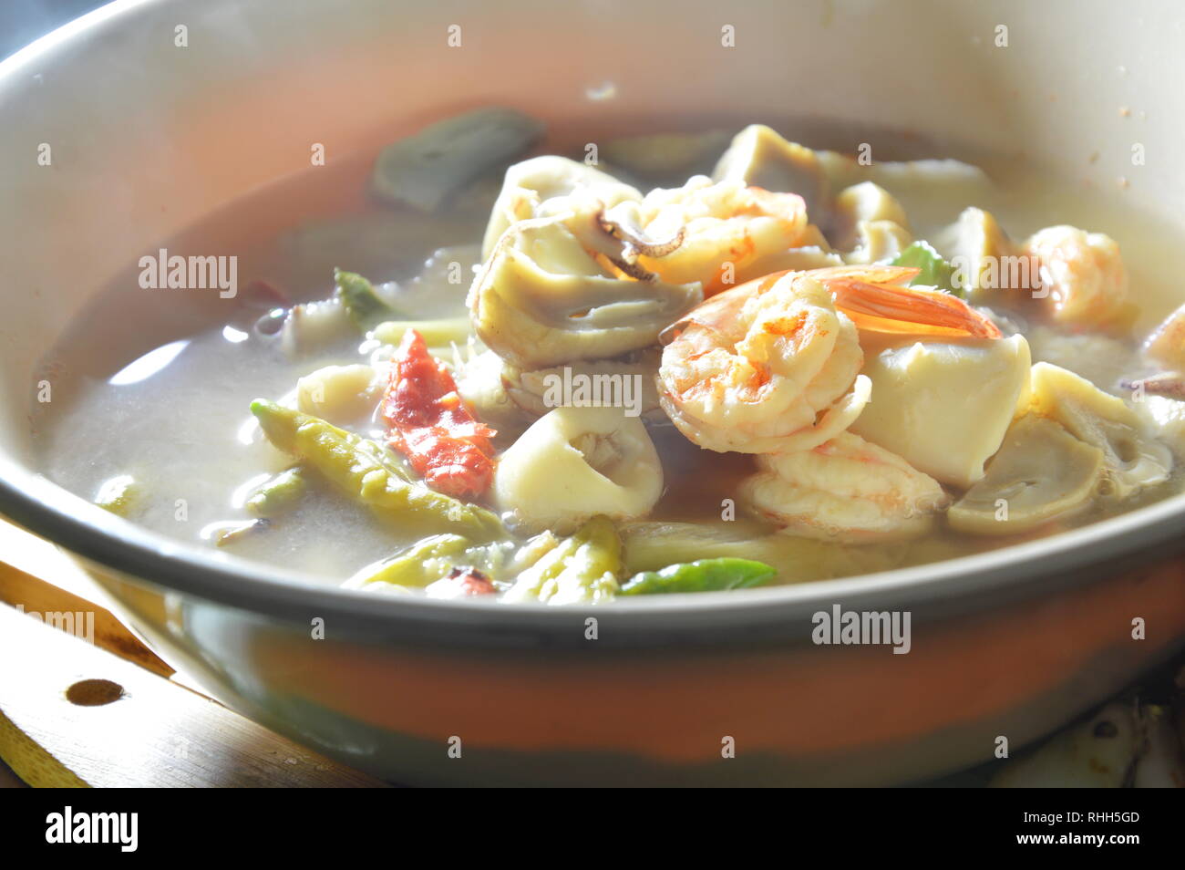 seafood Tom Yam hot soup and mixed herb Stock Photo - Alamy