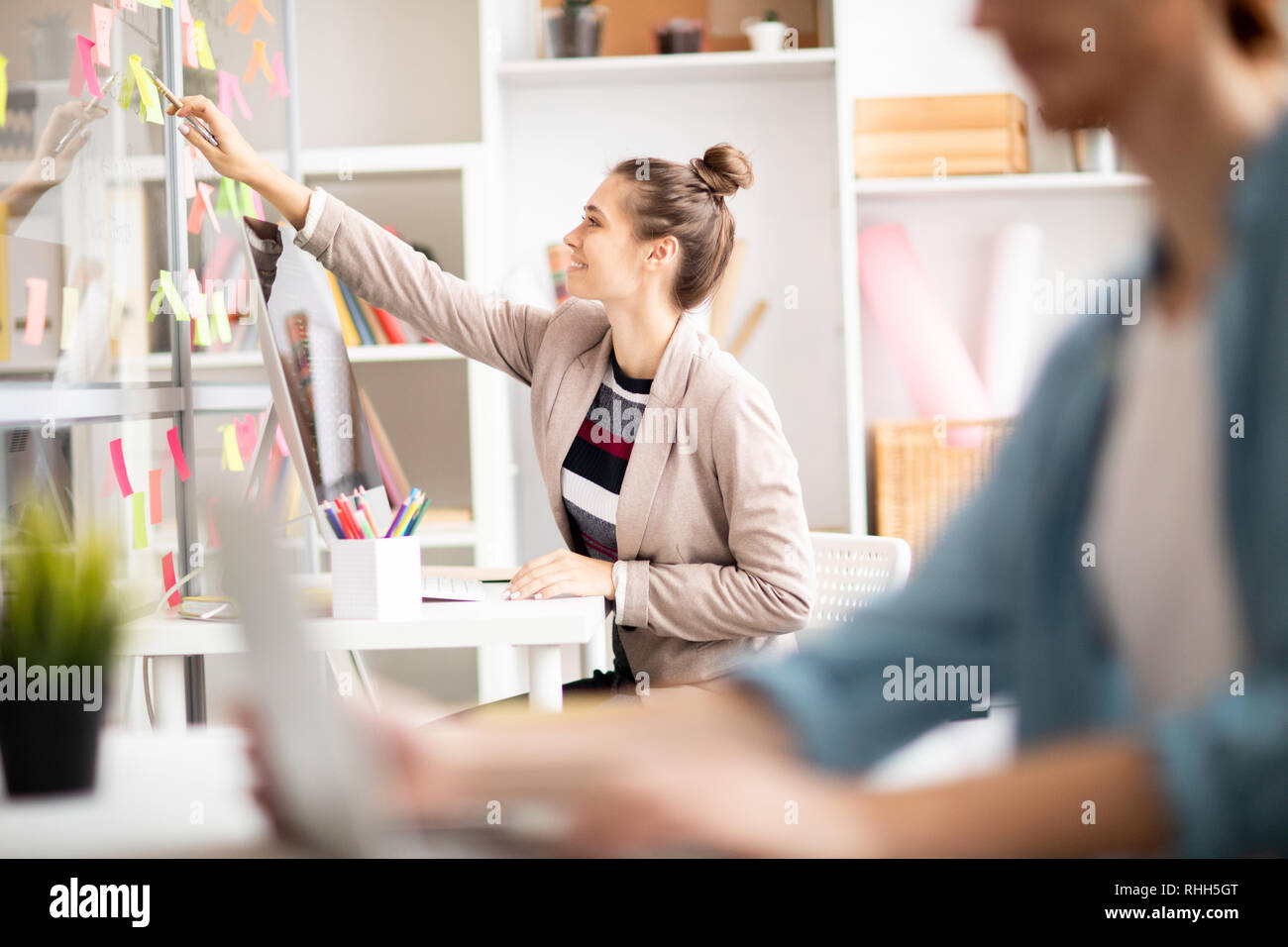 Pointing at note Stock Photo - Alamy