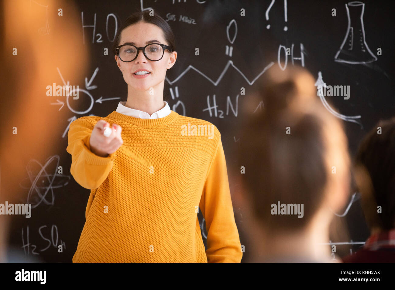 Pointing at student Stock Photo - Alamy