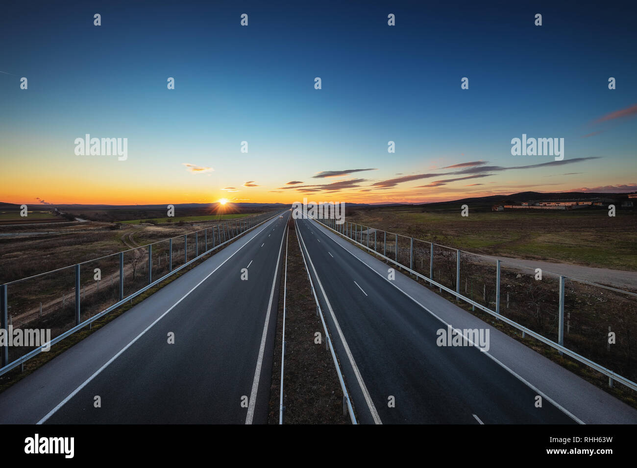 Aerial view of highway, sunset time Stock Photo - Alamy