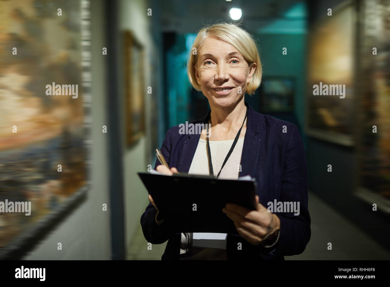 Female Art Gallery Curator Stock Photo - Alamy