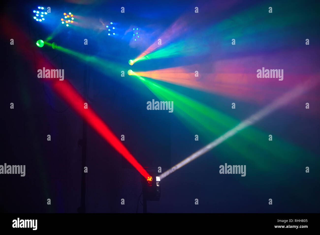 Stage lights in action at the concert. Lights show. Lazer show. Night ...