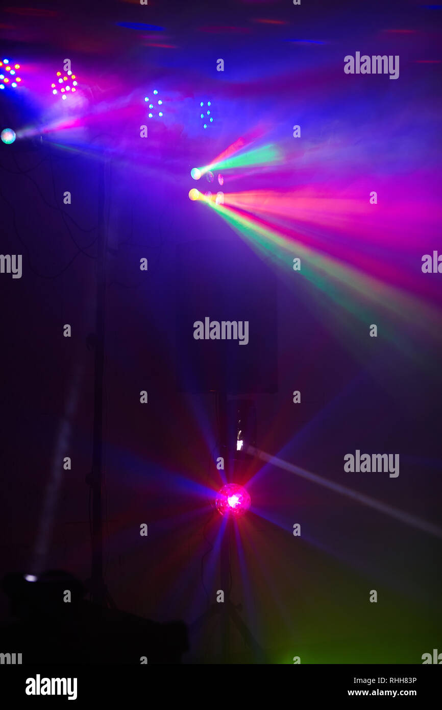 Stage lights in action at the concert. Lights show. Lazer show. Night ...