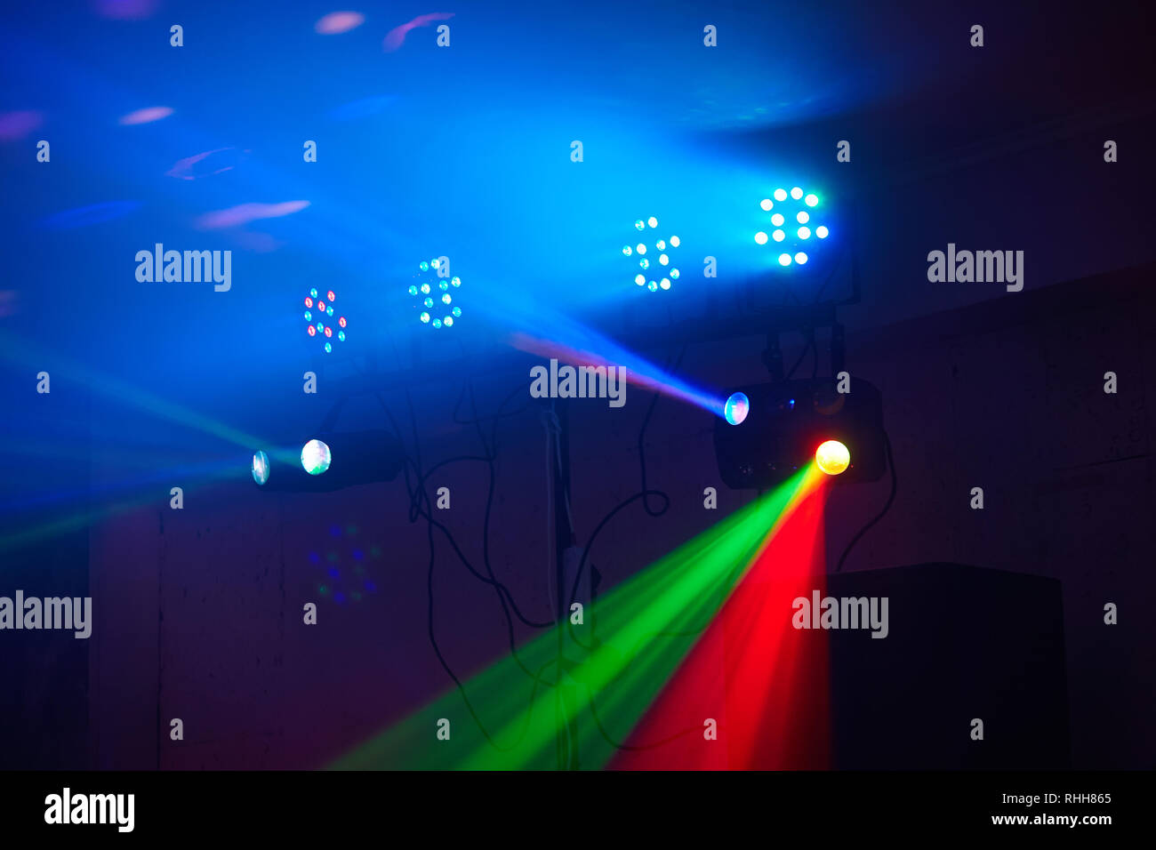 Stage lights in action at the concert. Lights show. Lazer show. Night ...