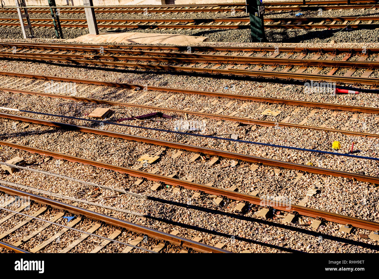 Tracks of a train near a station Stock Photo - Alamy
