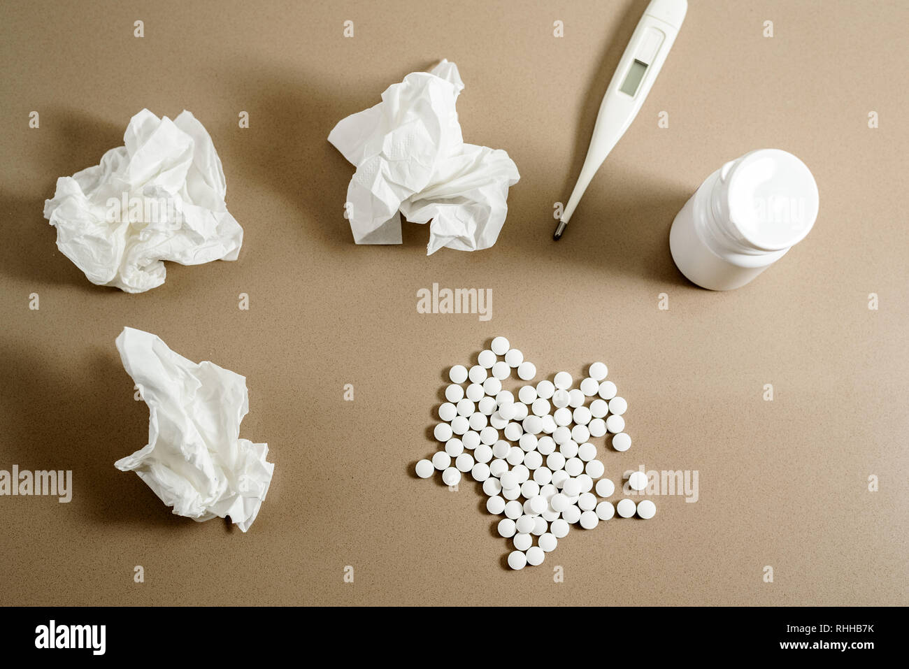 Concept of cold and treatment with medicines, dirty snot paper tissues ...