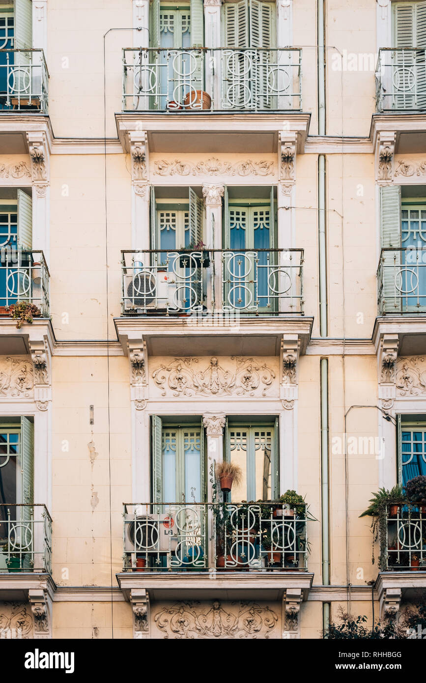 Windows with small balconies in Madrid, Spain Stock Photo - Alamy