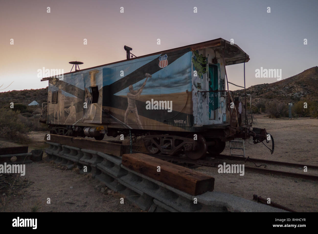 Old, decorated train wagon with image of working men labouring Stock ...