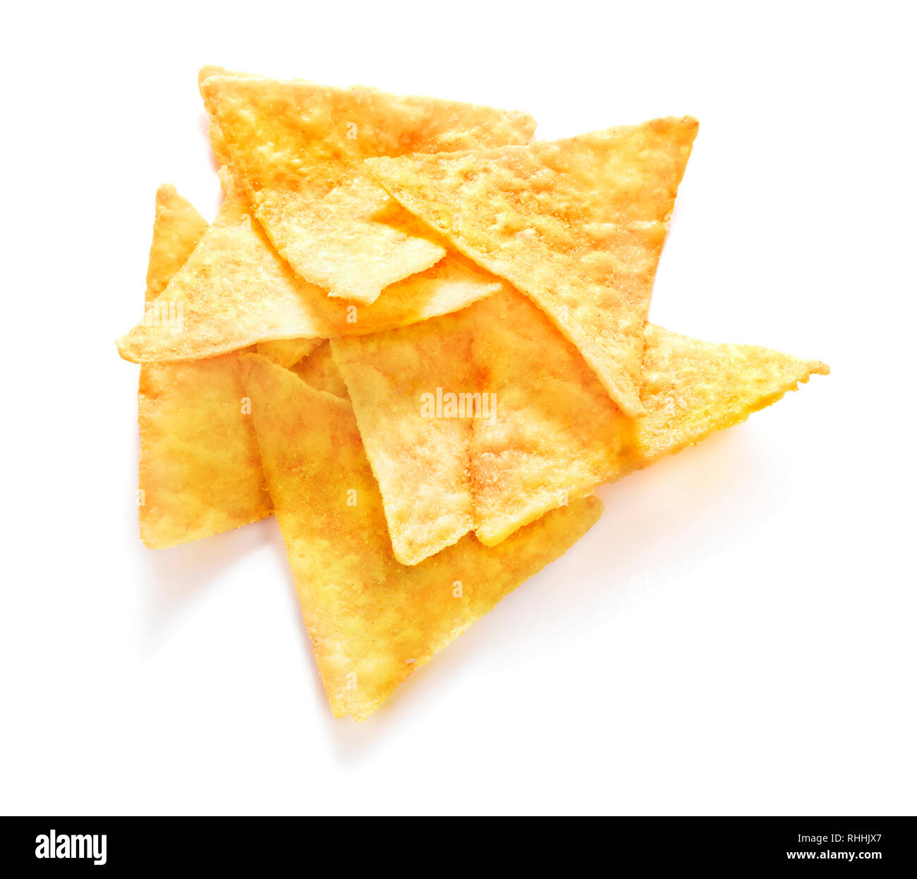 pile of nacho chips isolated on white background Stock Photo - Alamy