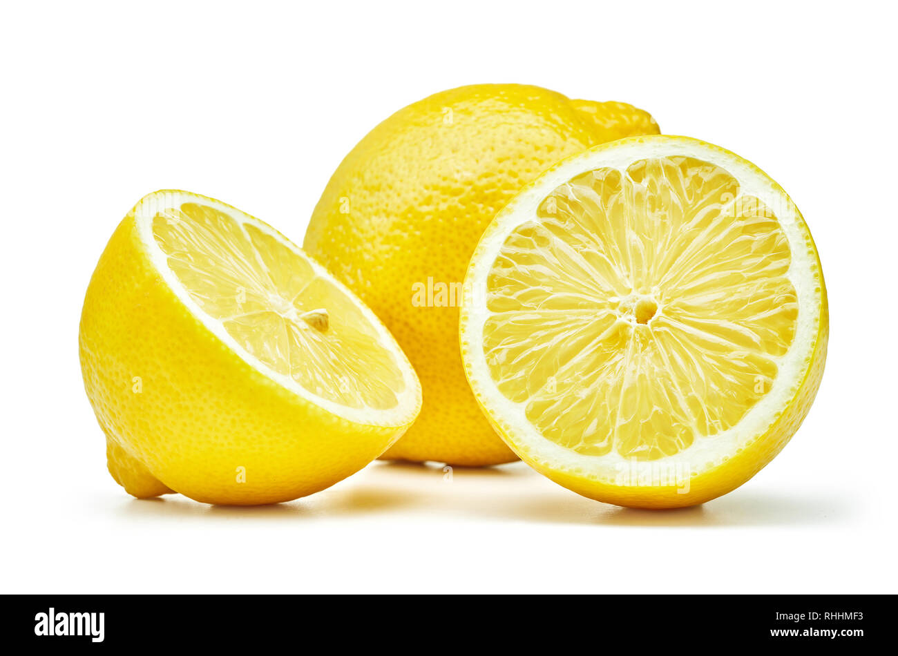 fresh cut lemon fruits isolated on white background Stock Photo - Alamy