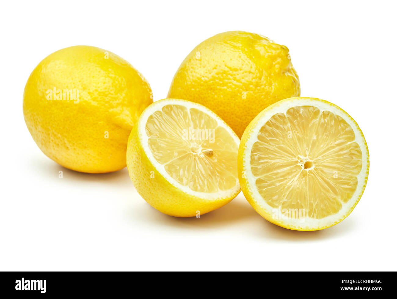fresh cut lemon fruits isolated on white background Stock Photo - Alamy