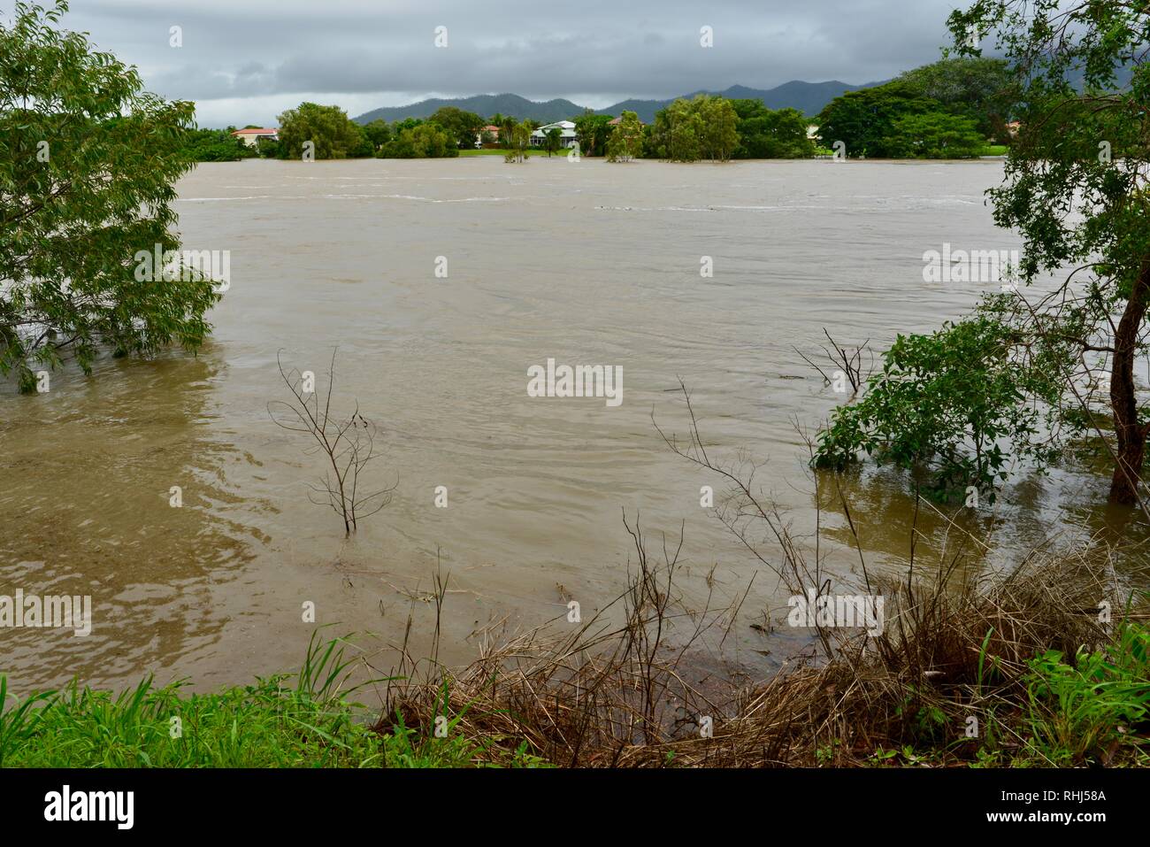 Ross river eroding the banks as flood water rage, Queensland, Australia ...