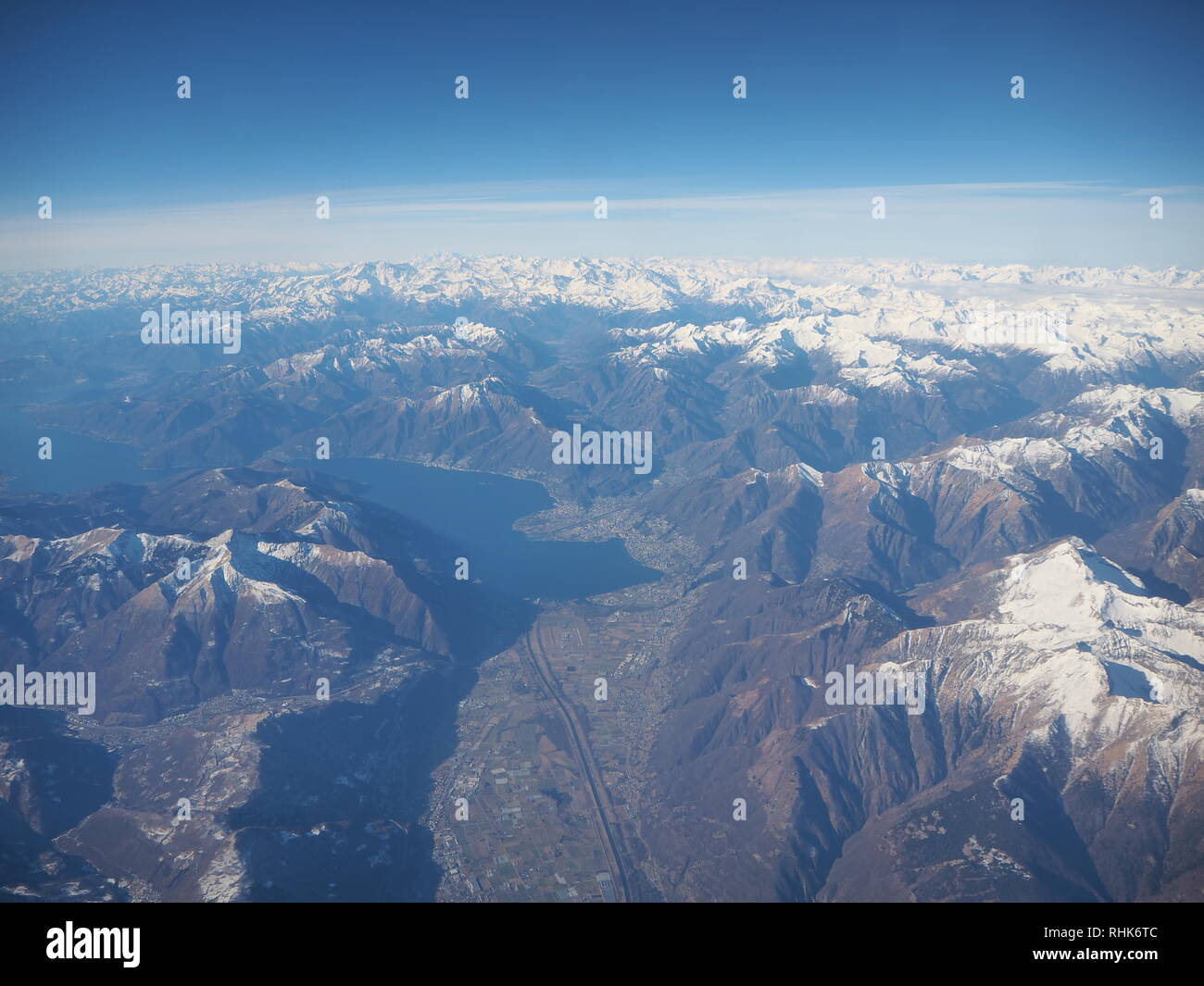 Aerial landscape of the Alps in Europe during winter season with fresh ...