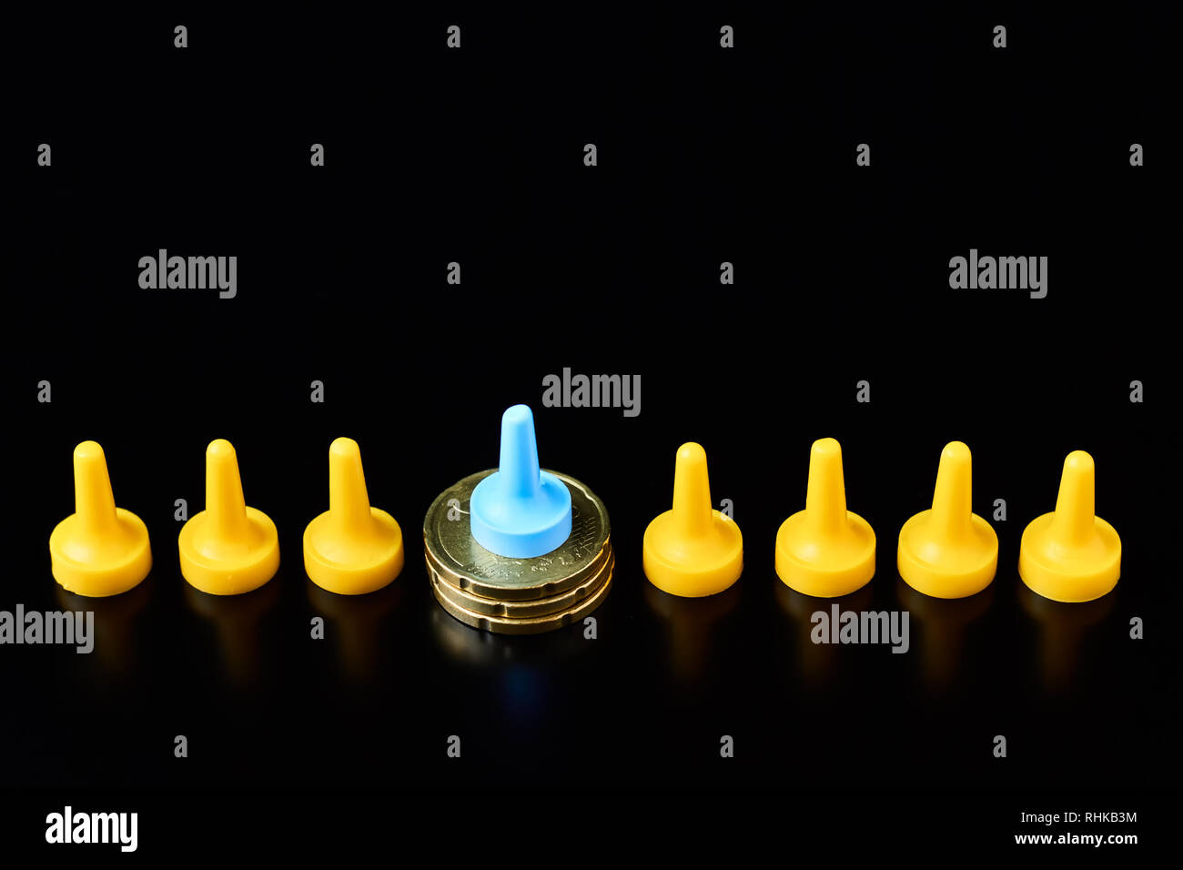 Income differences between rich and poor concept. Board game figure on ...