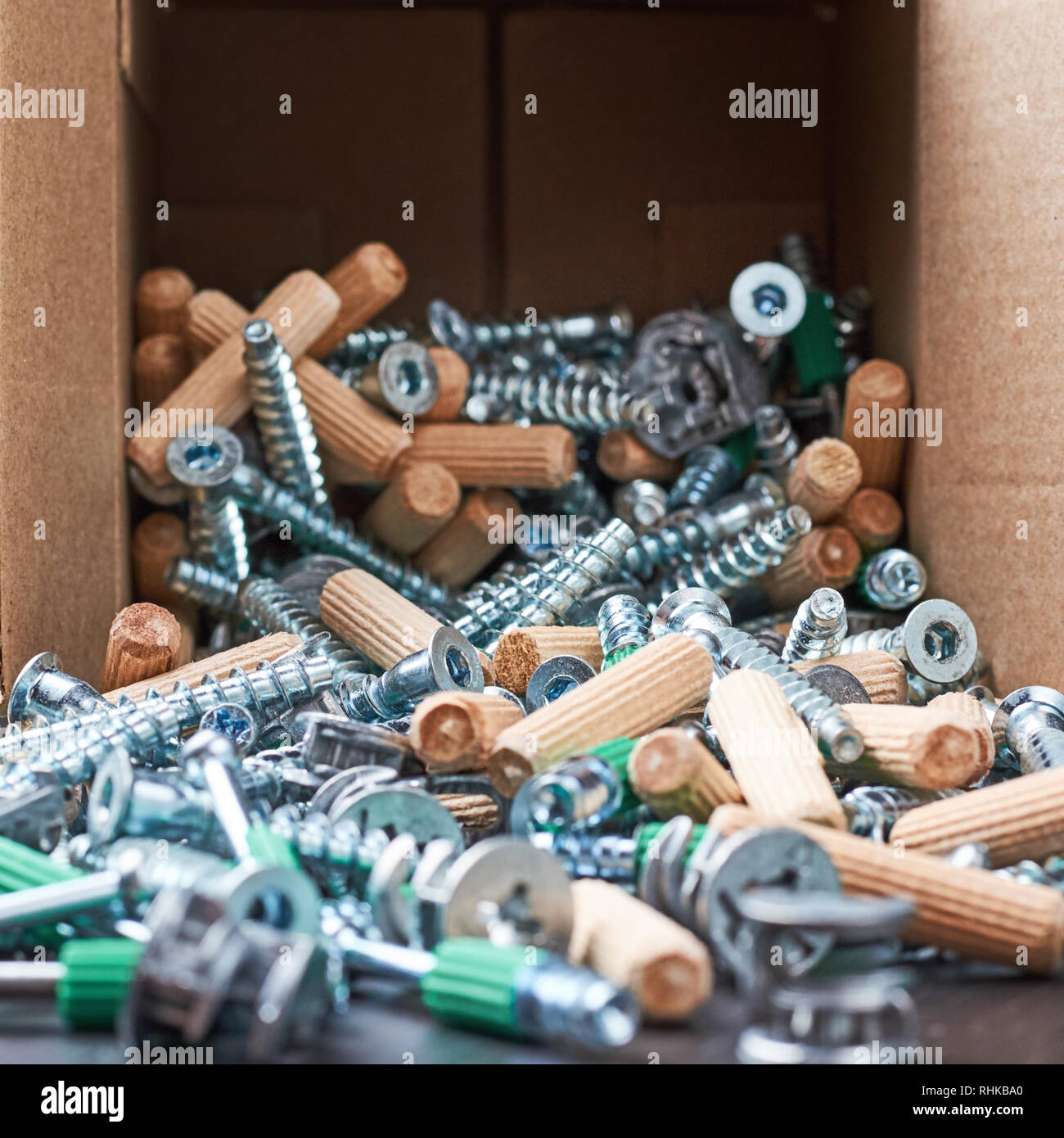 Open box with fall out tools for furniture assembly, closeup Stock ...