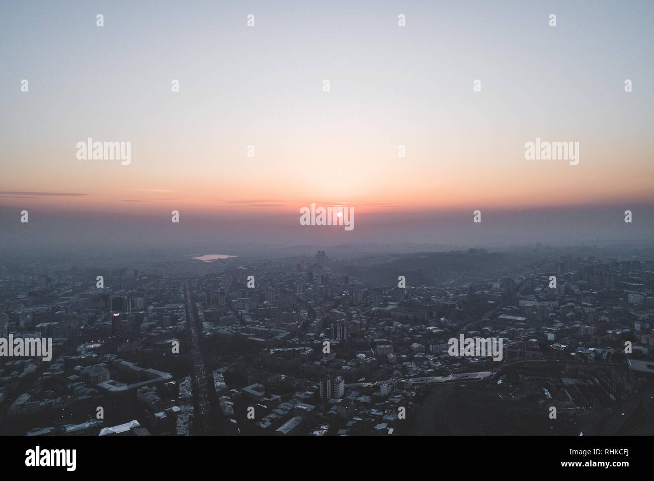 Beautiful sunrise over the city Stock Photo - Alamy