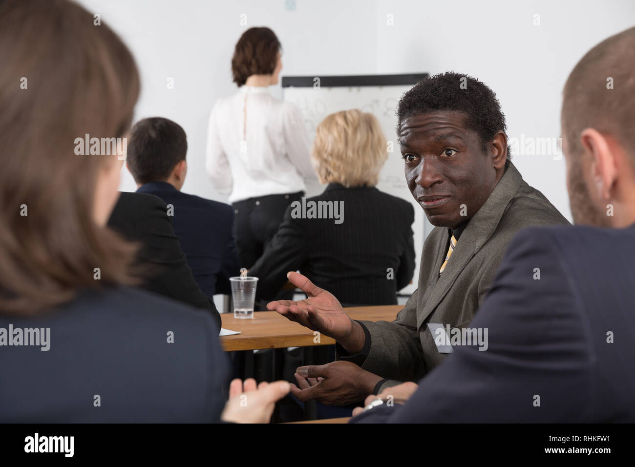 Surprised african american businessman talking hi-res stock photography ...