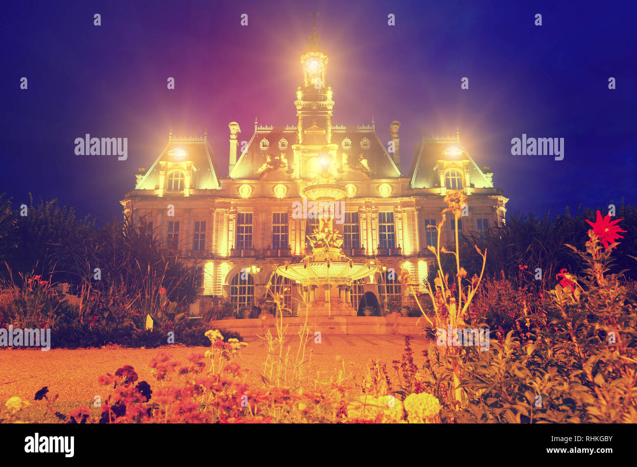 Impressive architecture of illuminated Limoges City Hall in twilight ...
