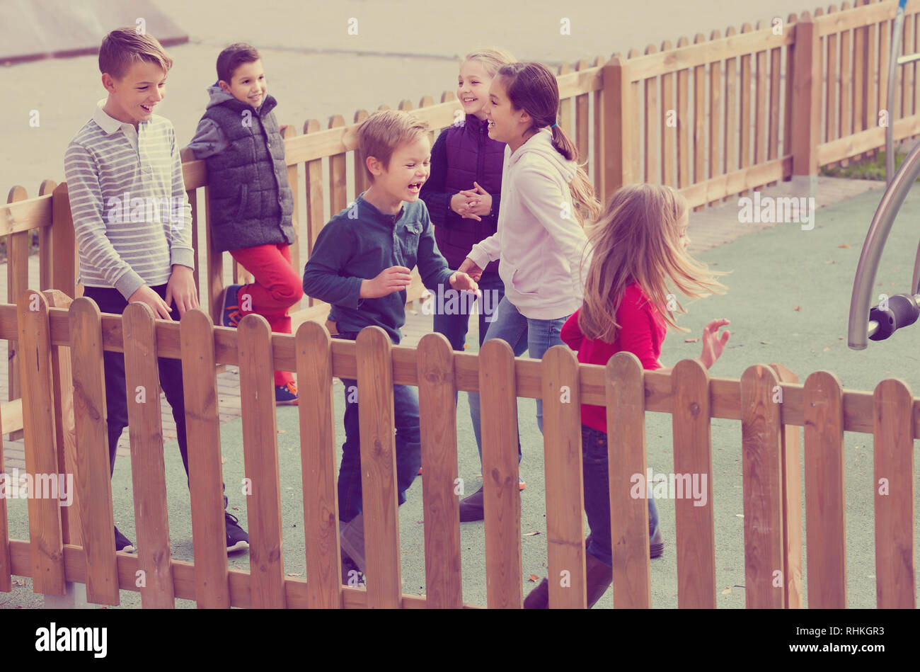 Children playing romp game Touch-last at outdoor Stock Photo - Alamy